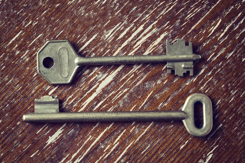 Two Metal Keys on a Wooden Surface Stock Image - Image of rusty ...