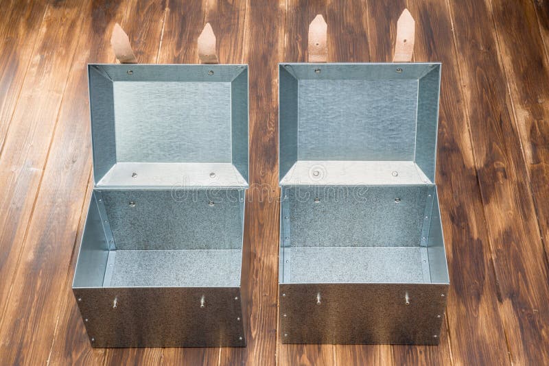 Two Metal Tool Box on Wooden Table Stock Image - Image of iron, front ...