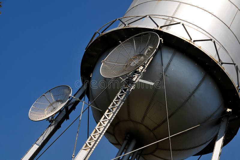 Two Microwaves on Water Tank Stock Photo - Image of computers, digital ...