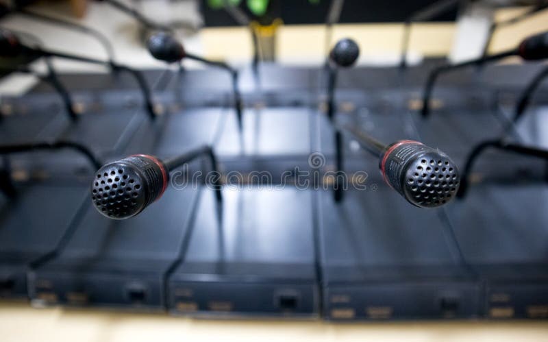 Two Mics in Focus among Several Stock Photo - Image of metal ...