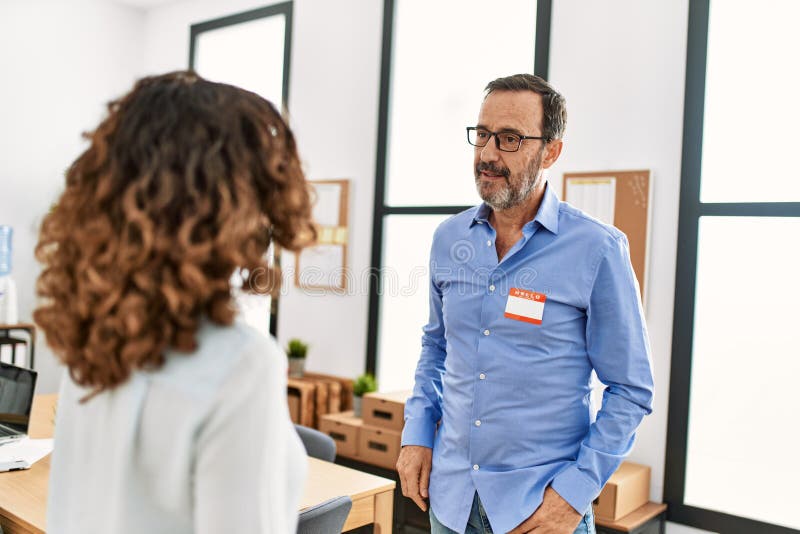 Two Middle Age Business Workers Smiling Happy and Talking at the Office ...