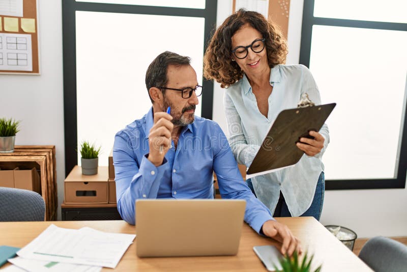 Two Middle Age Business Workers Smiling Happy Working at the Office ...