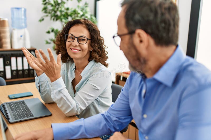 Two Middle Age Business Workers Smiling Happy Working at the Office ...