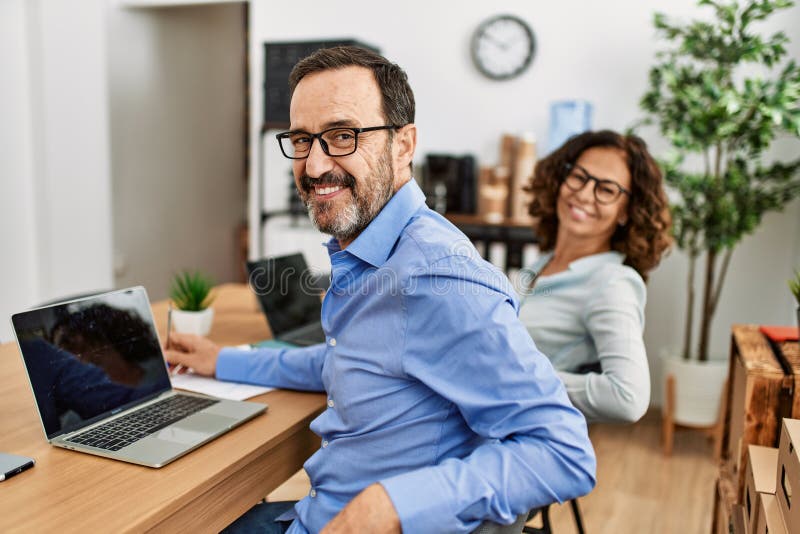 Two Middle Age Business Workers Smiling Happy Working at the Office ...