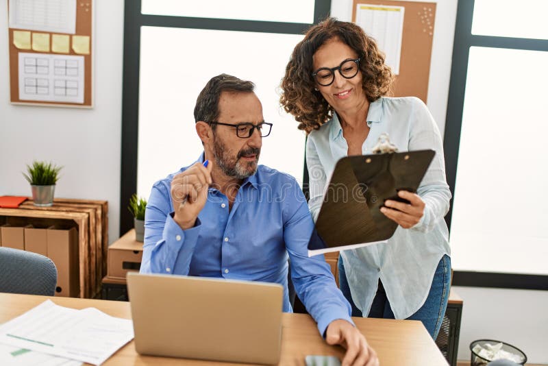 Two Middle Age Business Workers Smiling Happy Working at the Office ...