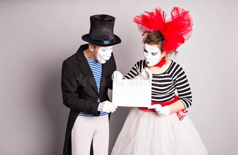 Two Mimes with a Sign for Advertising, April Fools Day Concept Stock ...