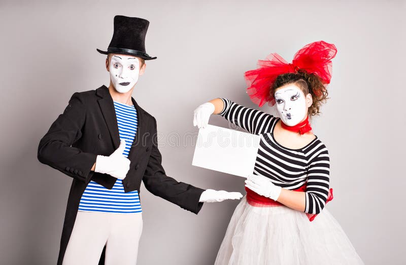 Two Mimes with a Sign for Advertising Stock Photo - Image of business ...