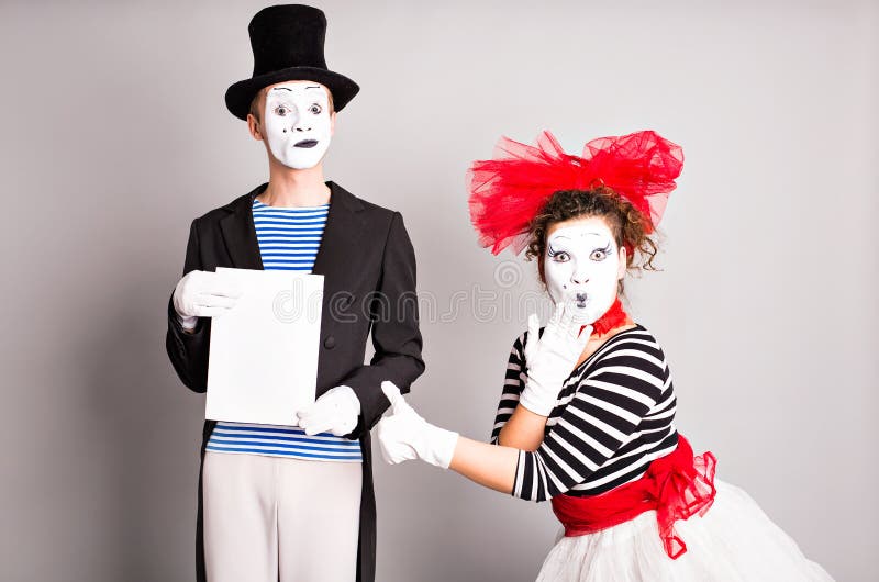 Two Mimes with a Sign for Advertising Stock Photo - Image of beautiful ...