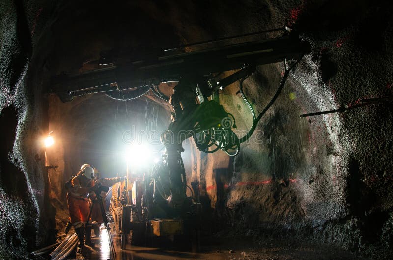 Miners at Work in an Underground Tunnel Stock Photo - Image of safety ...