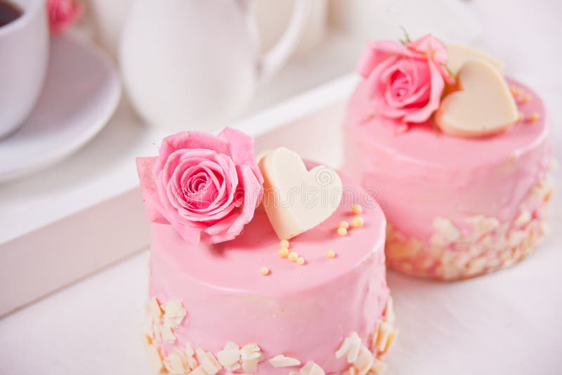 Two Mini Cakes with Roses on a White Table. Romantic Dinner Concept ...