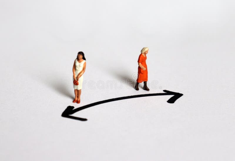 Miniature People Who Stand in a Different Direction. Stock Photo ...