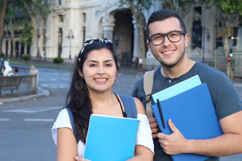 Two Mixed Race Students Smiling Outdoors Stock Photo - Image of ...