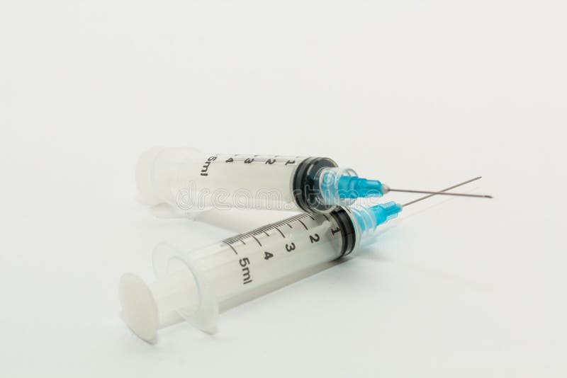 Two 5ml Disposable Syringes with Blue Needles Stock Image - Image of ...