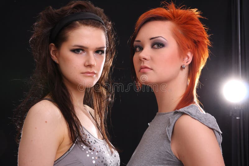 Two models posing stock image. Image of beautiful, background - 6853979