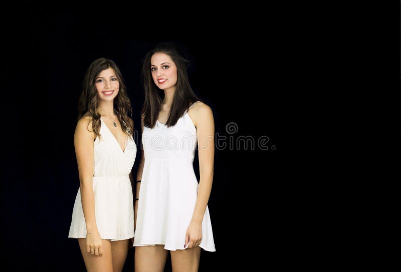 Two Models in White Dress Posing Smiling. Stock Photo - Image of white ...
