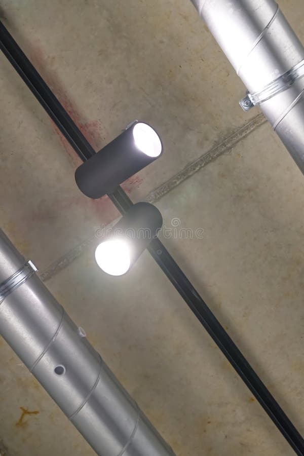 Modern Ceiling Lights with Exposed Pipes Stock Image - Image of ...