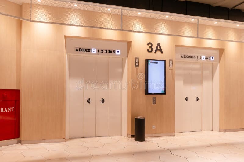 Two Modern Elevator or Lift with Closed Doors on the 3A Floor at a ...