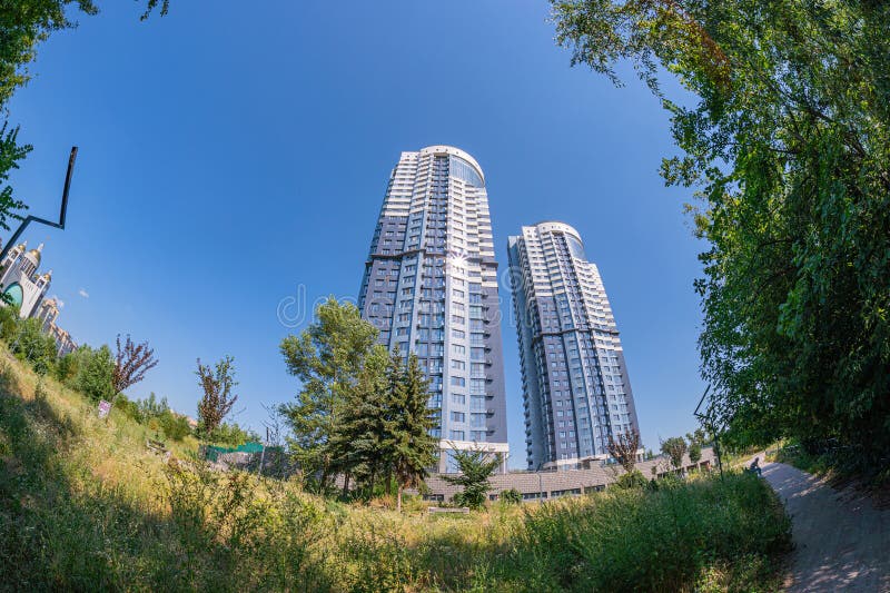 Two Modern High-rise Buildings with Setbacks, Contrasting Transparency ...