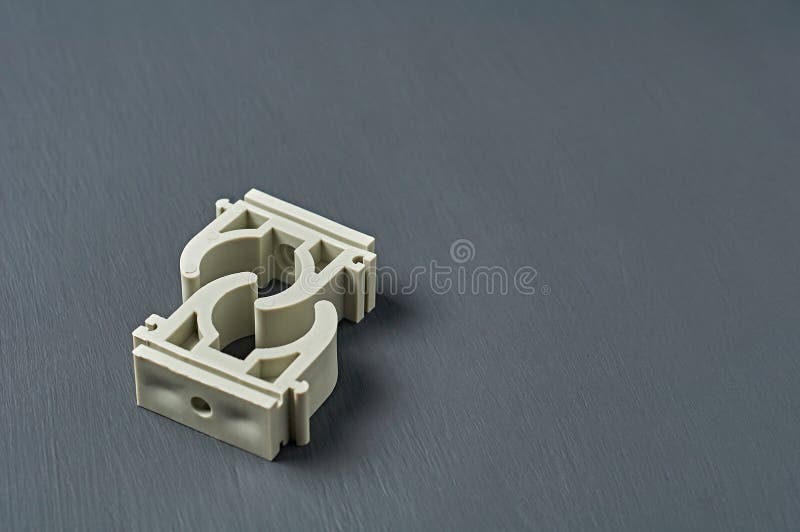 Two Modern Plastic Fasteners for Polypropylene Pipe for Water and ...