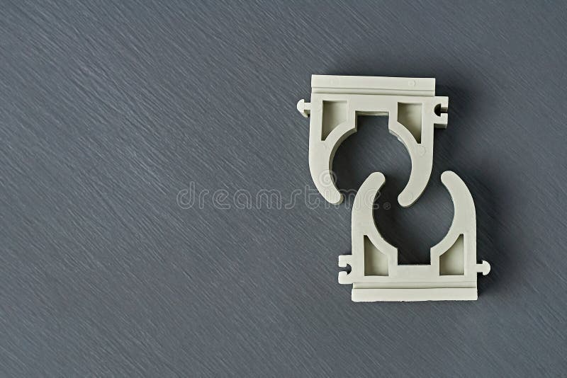 Two Modern Plastic Fasteners for Polypropylene Pipe for Water and ...