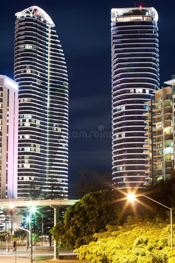 Two modern towers at night stock photo. Image of monorail - 20961354