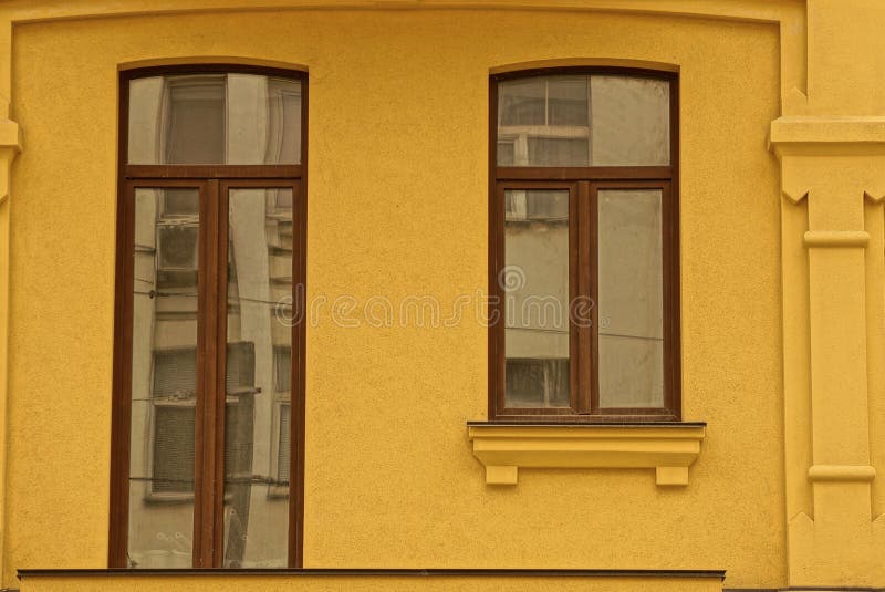Two Modern Windows on the Brown Wall of the House Stock Photo - Image ...