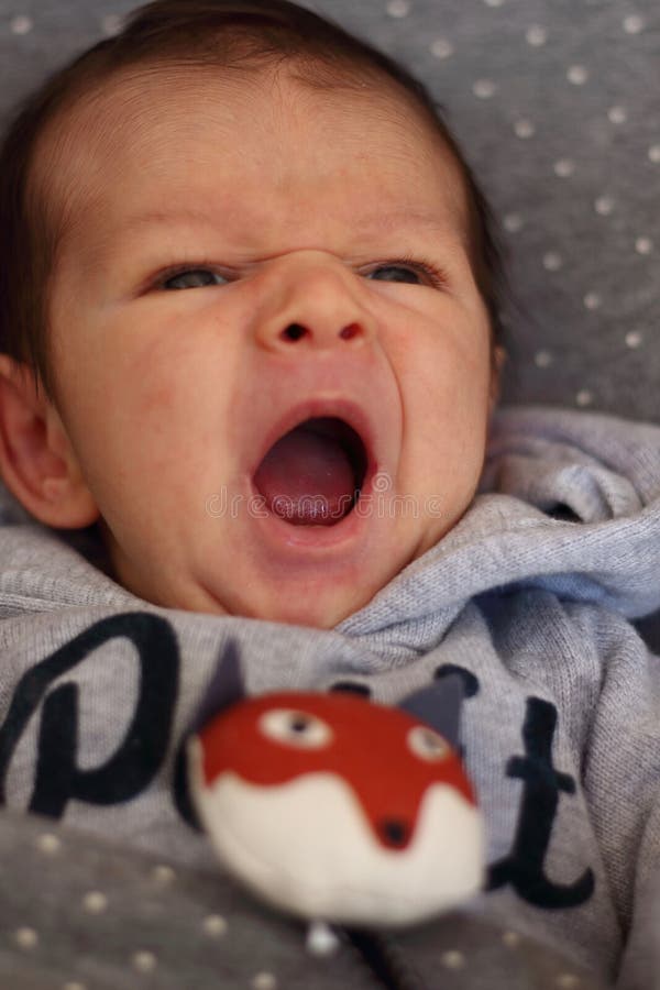 Baby yawning stock image. Image of mouth, fragile, blanket - 30360263
