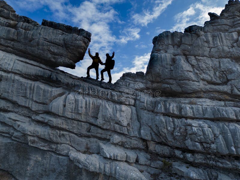 Two Mountaineers Exploring in Difficult Mountains, Rare, Virgin and ...