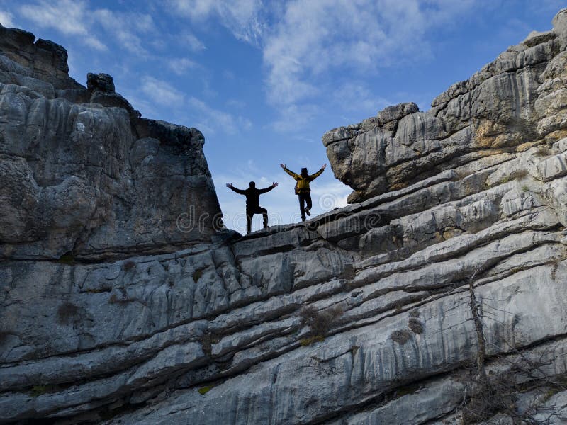 Two Mountaineers Exploring in Difficult Mountains, Rare, Virgin and ...