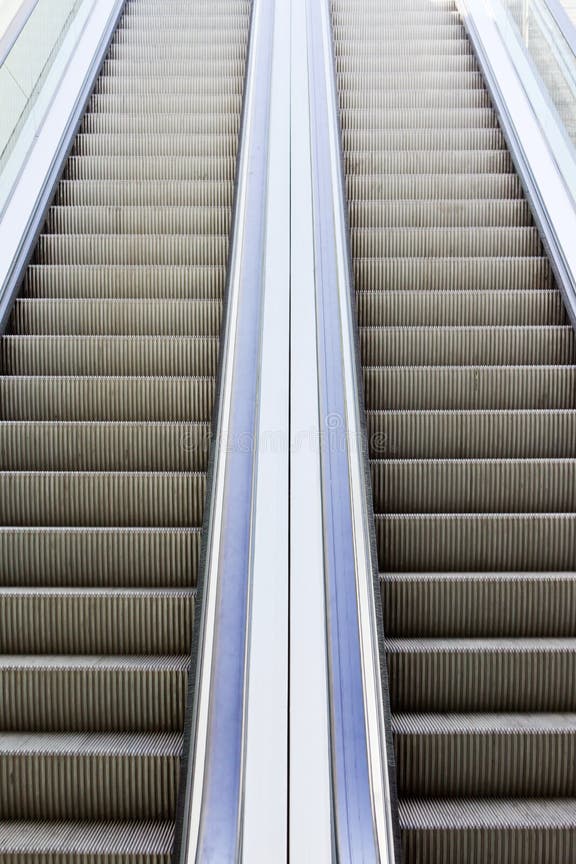 Two moving stairs stock photo. Image of building, symmetry - 28947712
