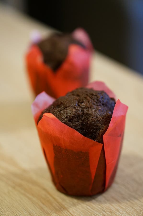 Two muffins stock photo. Image of chocolate, paper, snack - 51421226