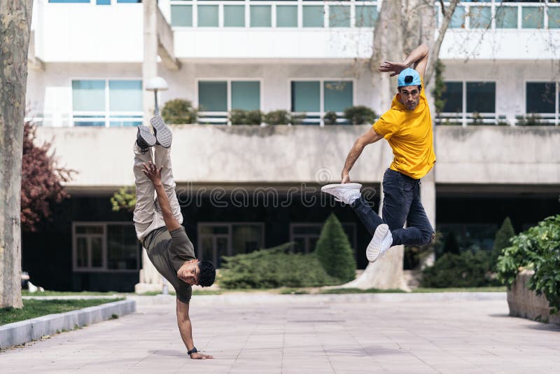 Cool Men Doing Break-Dance stock photo. Image of camera - 264958752
