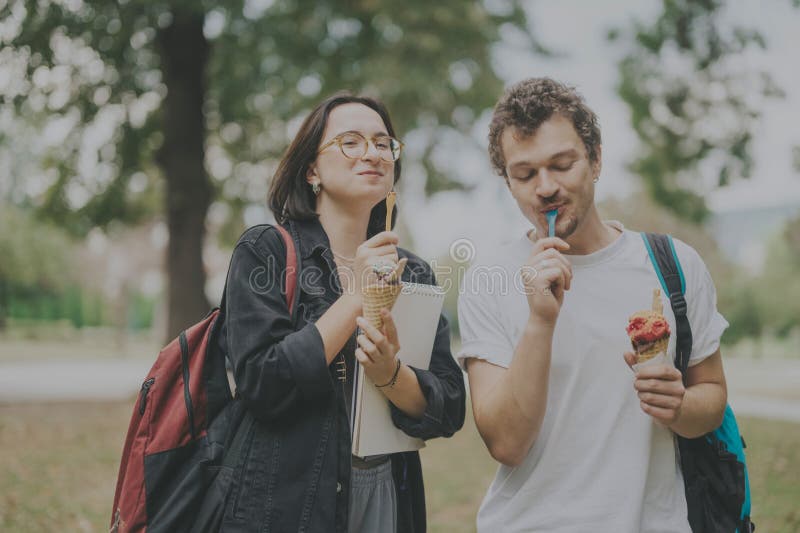 Multicultural Students Enjoying Ice Cream in the Park during Break ...