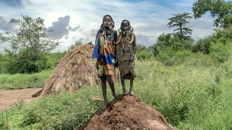 Two Mursi Tribe Girls From Ethiopia The Women Of The Mursi Tribe Have