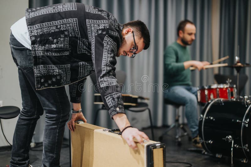 Two Musicians Engaging in a Studio Rehearsal Session, Fine-tuning Their ...