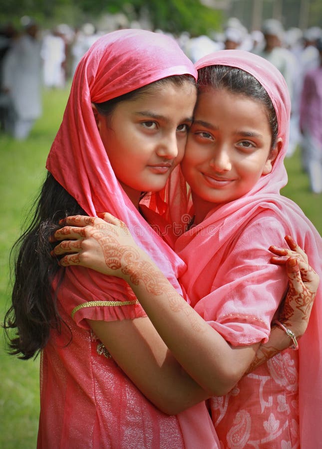 Two Muslim Cute Girls Hugging on Eid Ul Fitr Editorial Photo - Image of ...