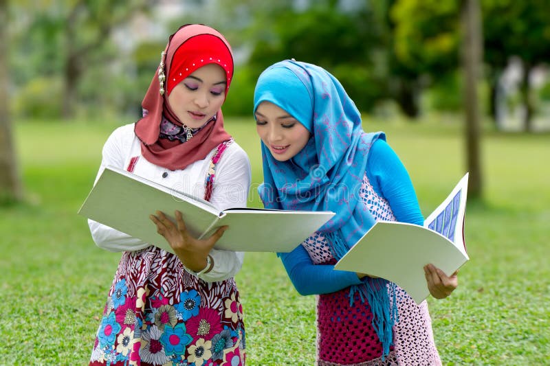 Two Muslim Girls with Books Stock Photo - Image of read, readers: 21452142