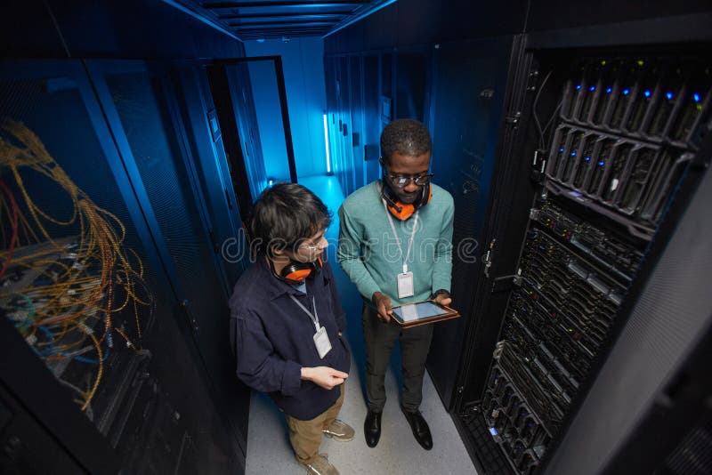 Server Engineers Doing Network Upgrades Stock Image - Image of network ...
