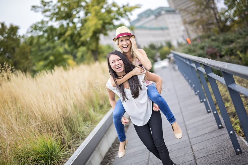Two Beautiful Young Women Having Fun in the City Stock Image - Image of ...