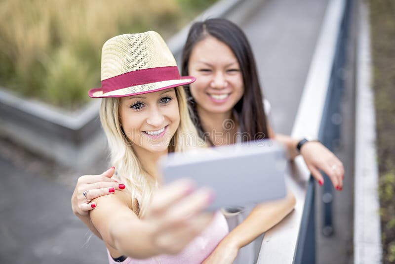 Two Beautiful Young Women Having Fun in the City Stock Image - Image of ...