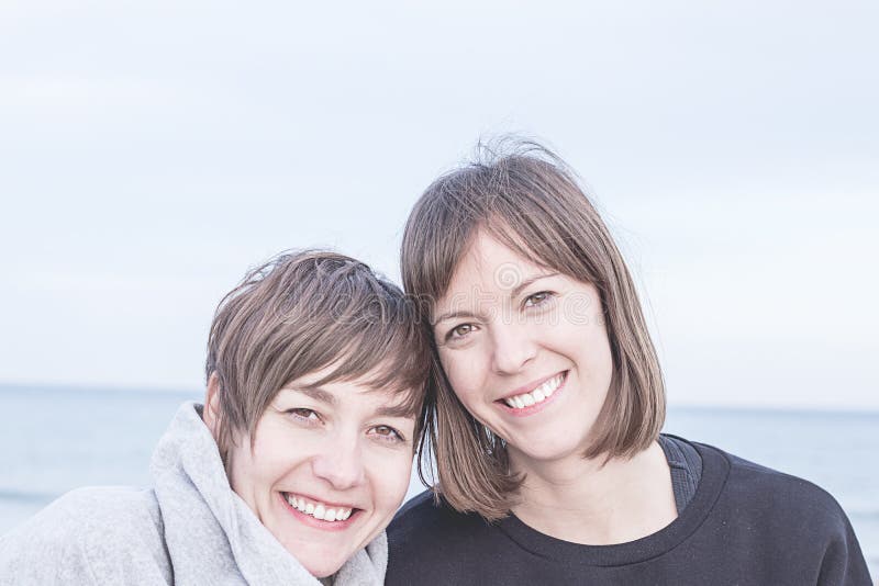 Two normal girls smiling stock image. Image of female - 114355769