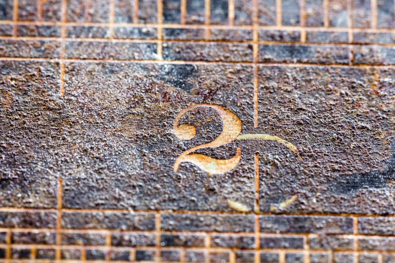 TWO stock image. Image of rusty, five, number, inscribed - 75109769