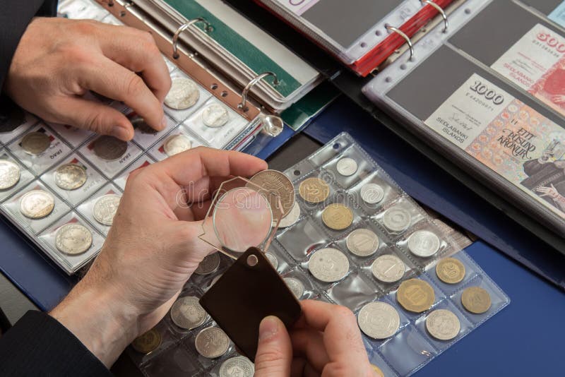 Two Numismatists Examines Collection of Coin Stock Image - Image of ...