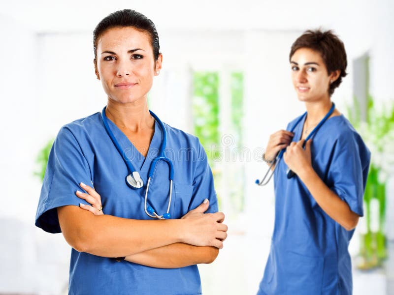 Two nurses stock image. Image of clinic, smile, female - 24623725