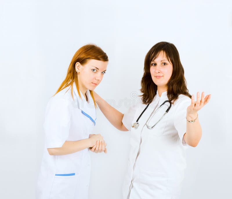Two nurses handshake stock image. Image of model, brunette - 4672333
