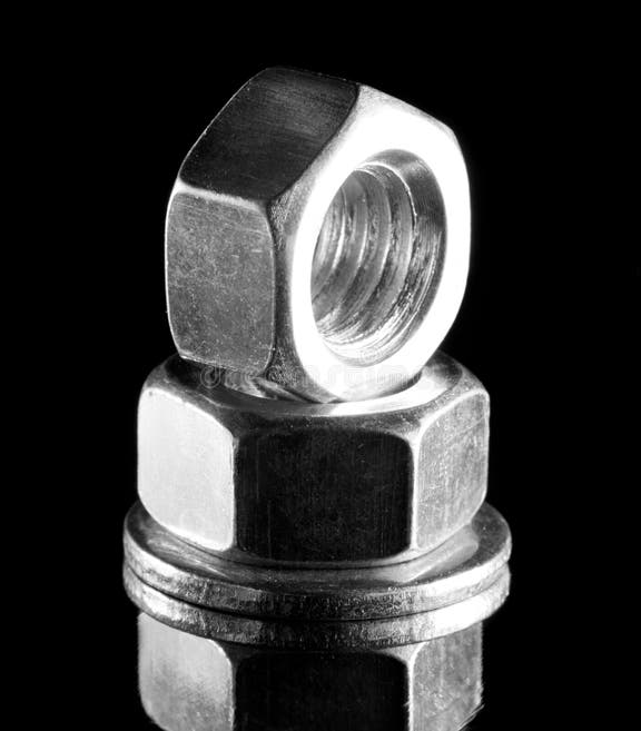 Two nuts stock image. Image of chrome, mechanical, mechanics - 22006275
