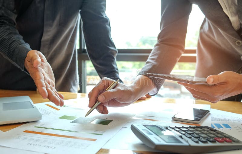 Two Office Workers are Analyzing Data,Business Concepts. Stock Image ...