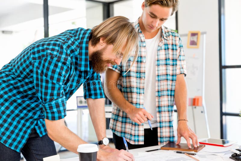 Two Office Workers at the Desk Stock Image - Image of planning ...