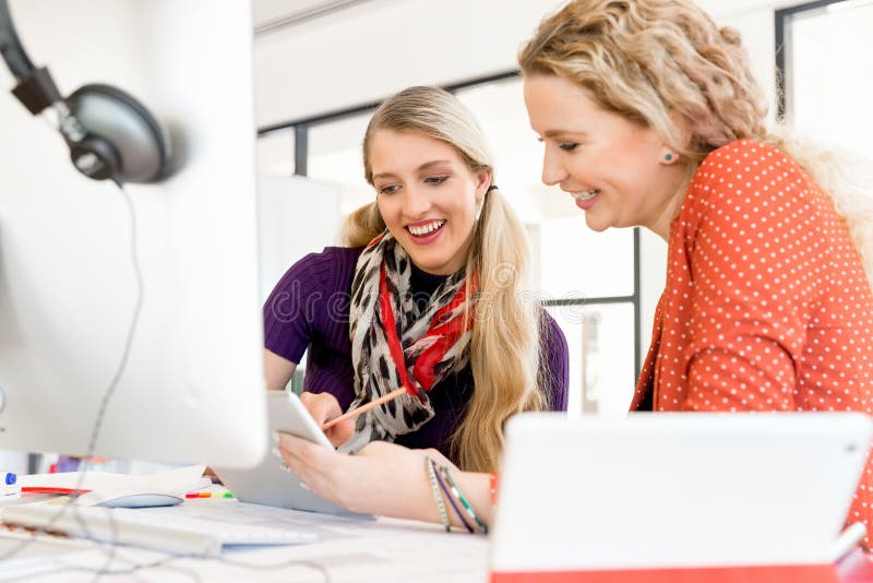 Two Office Workers at the Desk Stock Photo - Image of people, casual ...