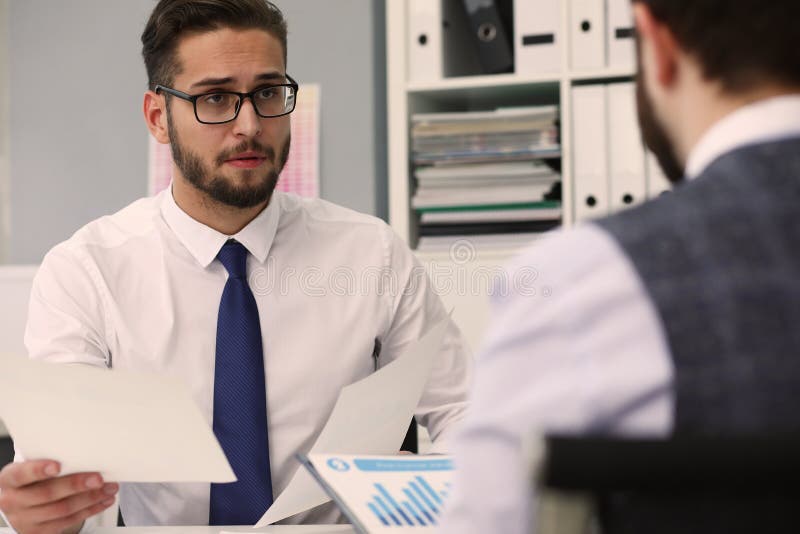 Handsome Young Manager Talking To His Colleague Stock Photo - Image of ...